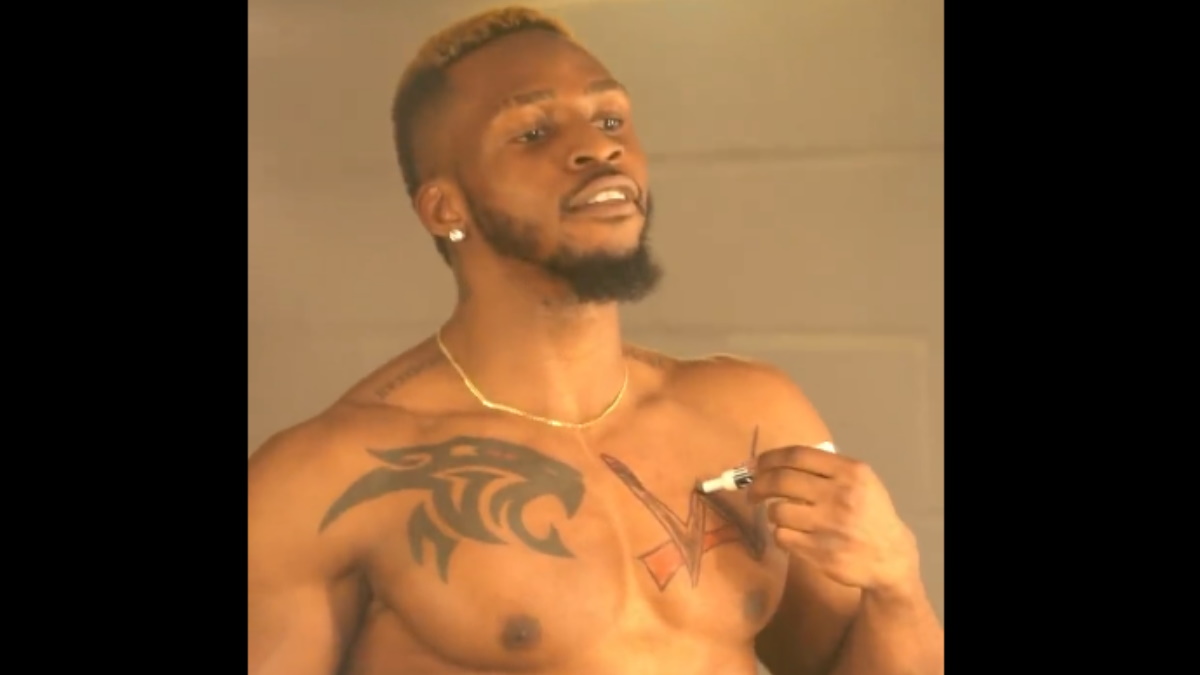 NXT Anonymous Footage Shows Edris Enofe FAKED WWE Logo Tattoo ...