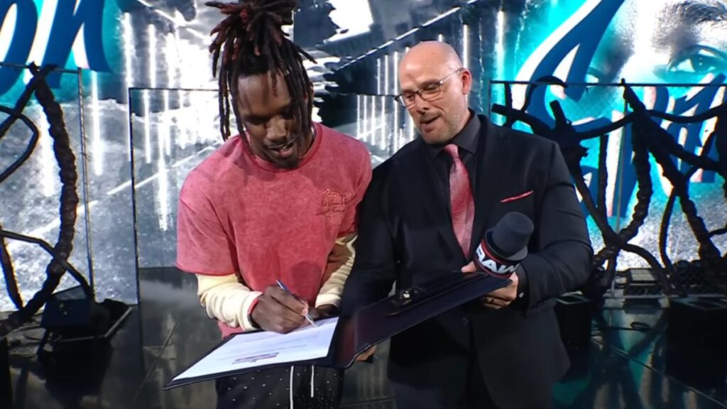 Real Reason Je'Von Evans WWE Raw Signing Took Place During Commercial ...