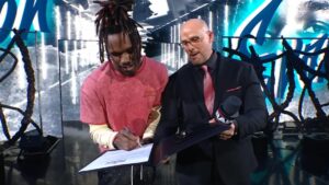 Real Reason Je'Von Evans WWE Raw Signing Took Place During Commercial ...